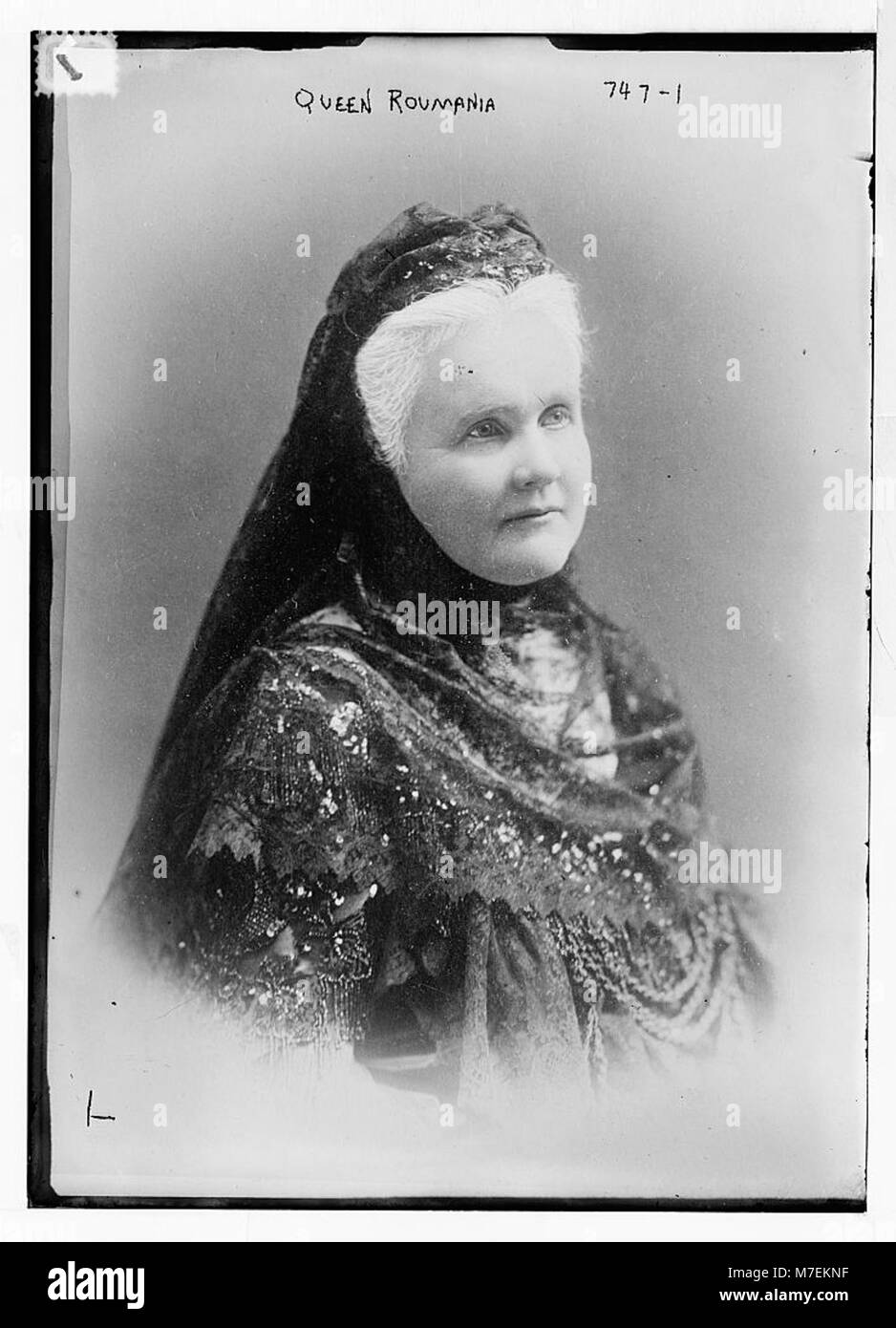 A photograph of the Queen of Roumania, offering a glimpse into her role ...