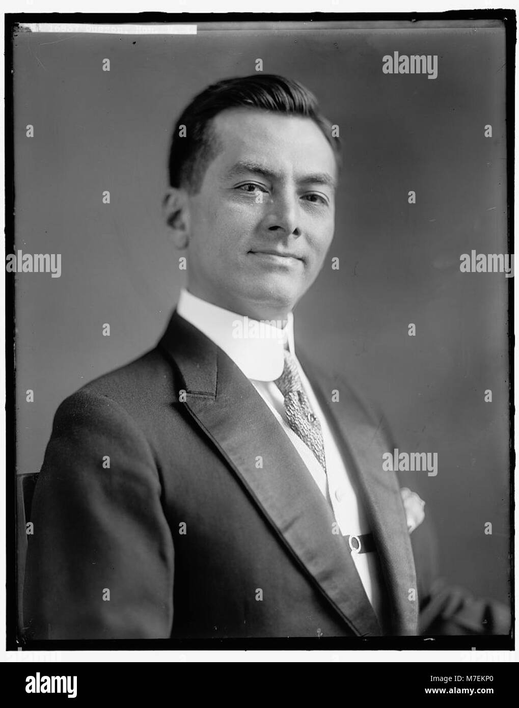 A formal portrait of Honorable M.L. Quezon, a prominent political ...