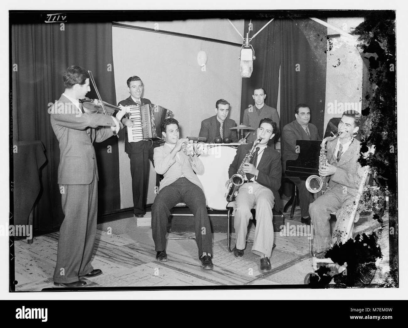 A photograph of radio artists at the Palestine Broadcasting Service ...