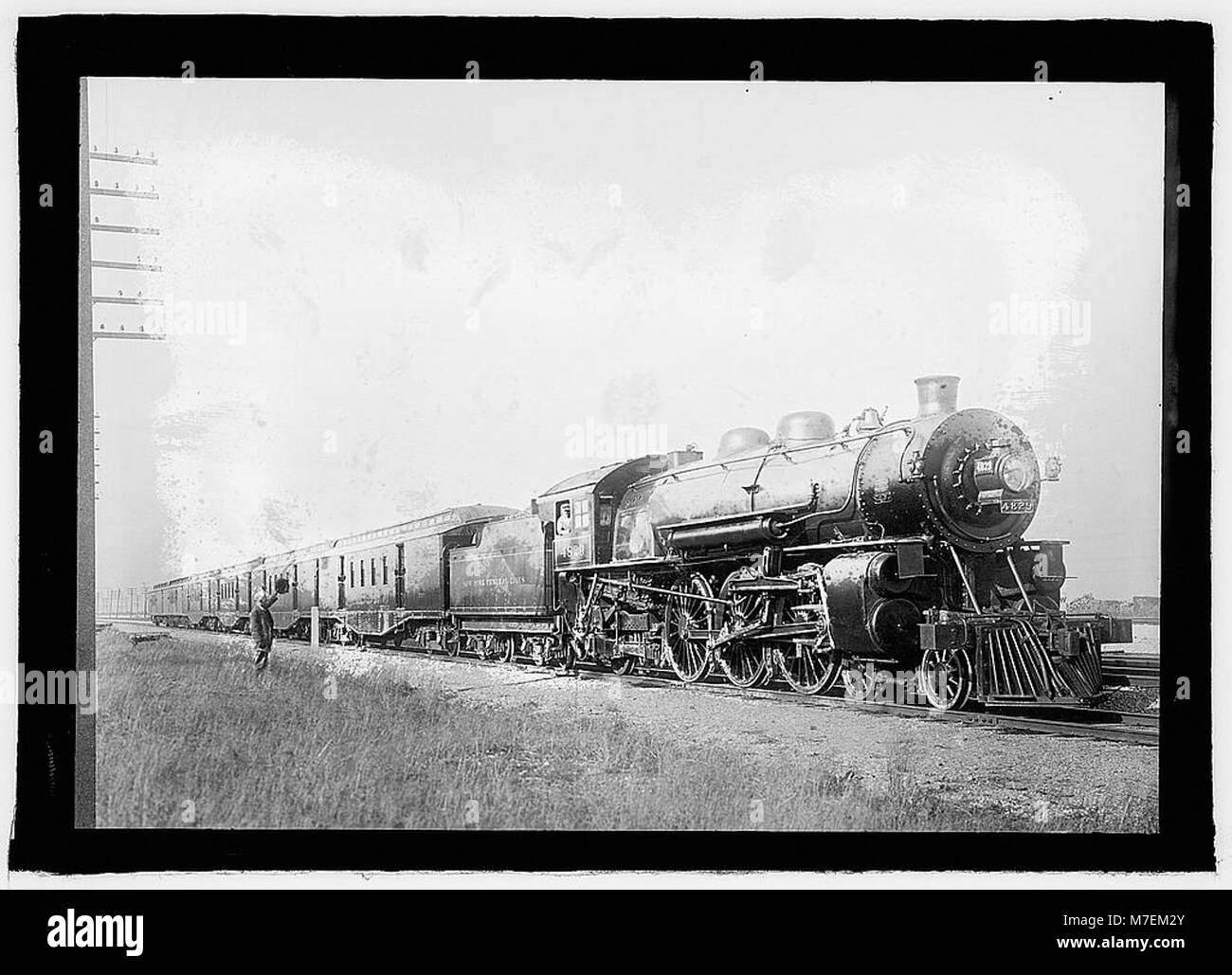 This image showcases a railroad locomotive, an important piece of 19th ...