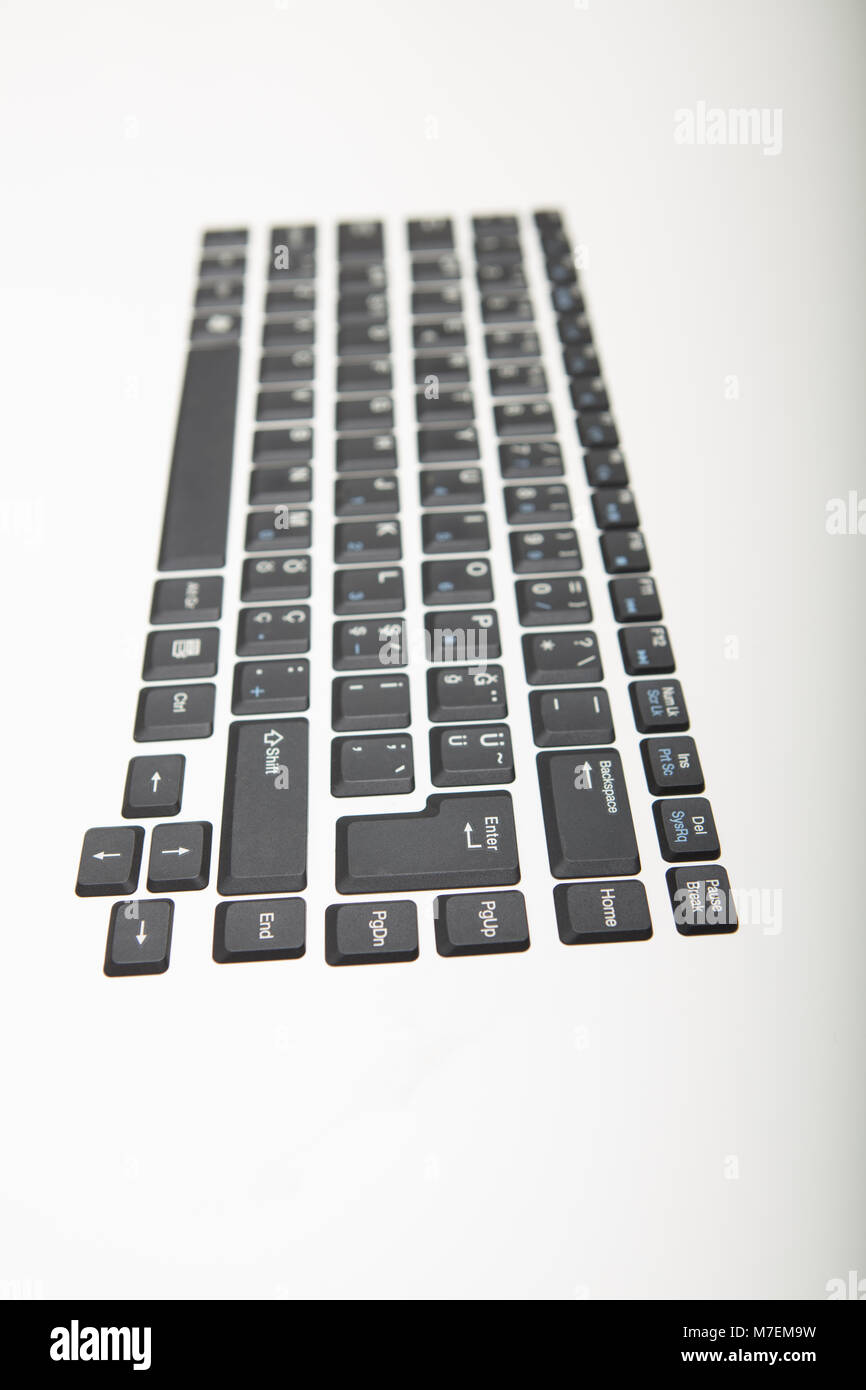 End on receding oblique angle view of a computer keyboard with black ...