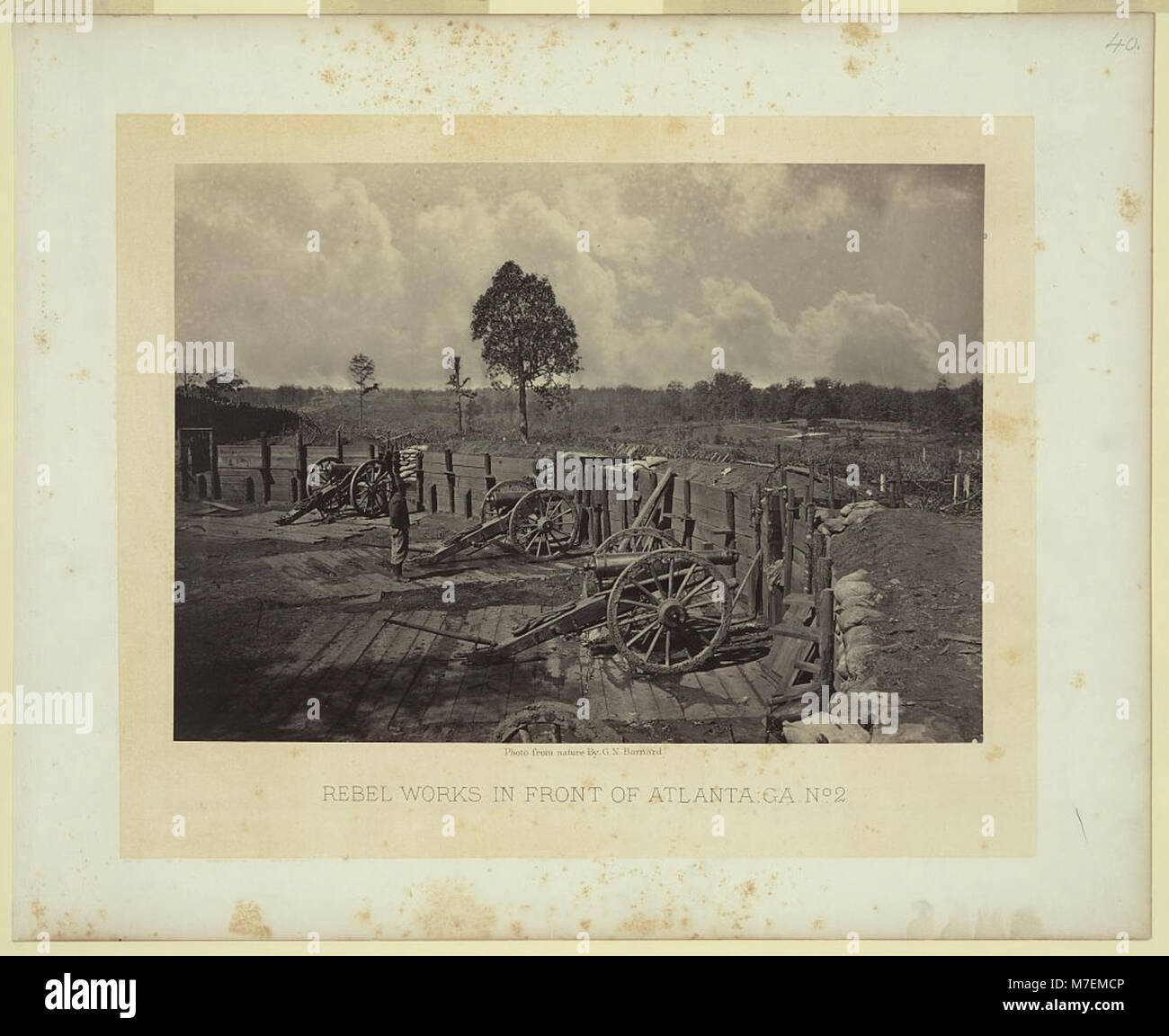 A Confederate soldier is shown working in front of Atlanta, Georgia ...