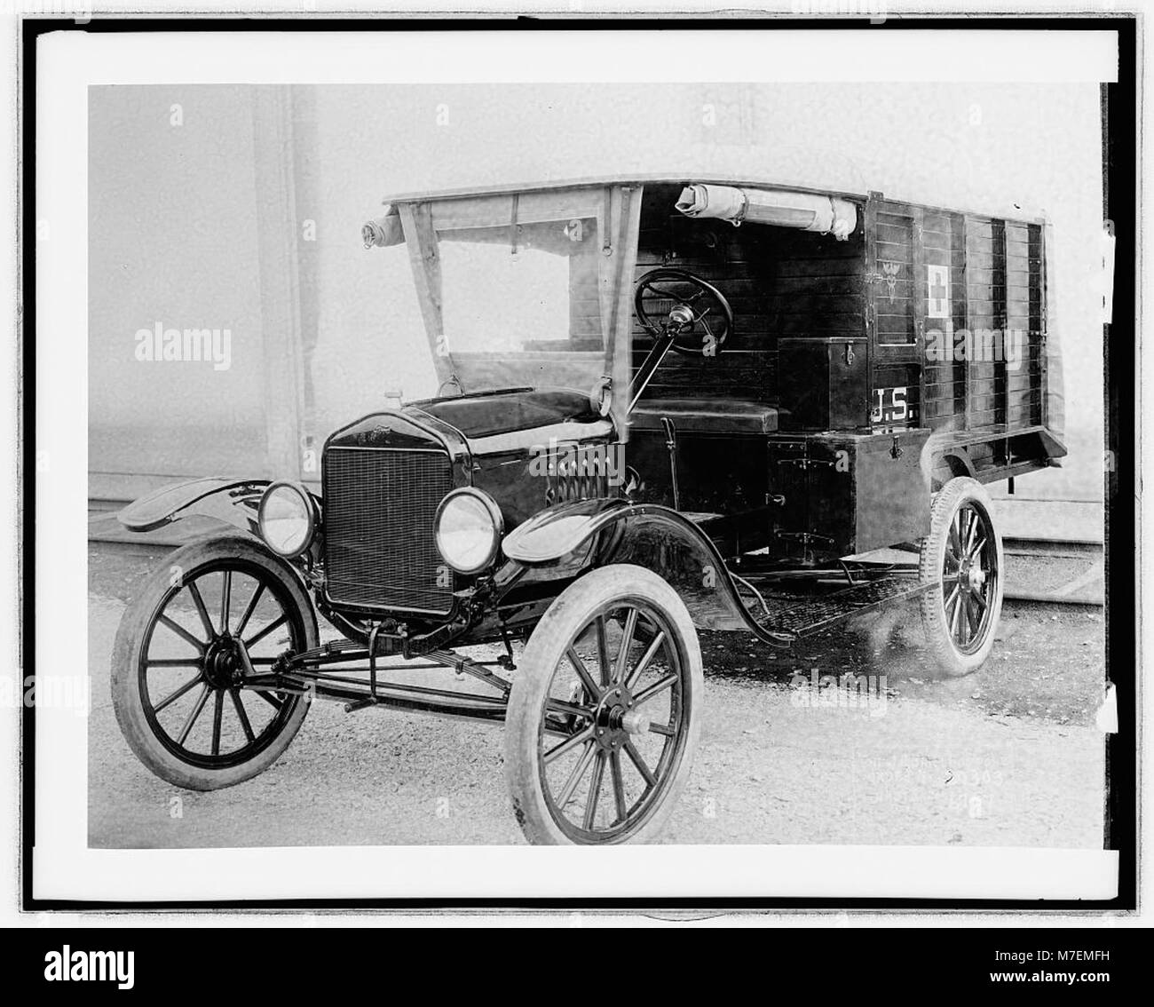 A photograph of a Red Cross ambulance, used for humanitarian purposes ...
