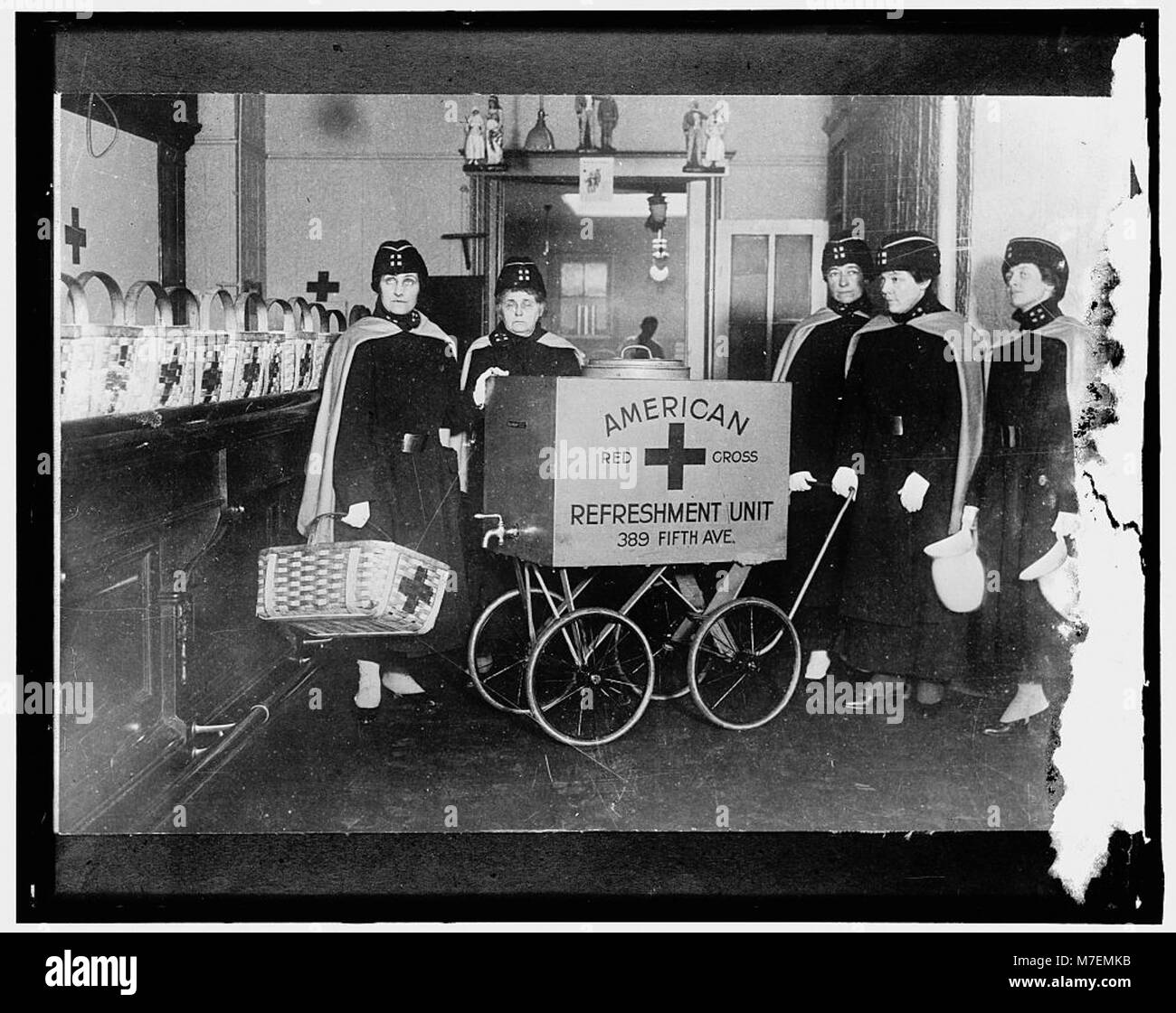 The Red Cross, a humanitarian organization, is depicted in this ...