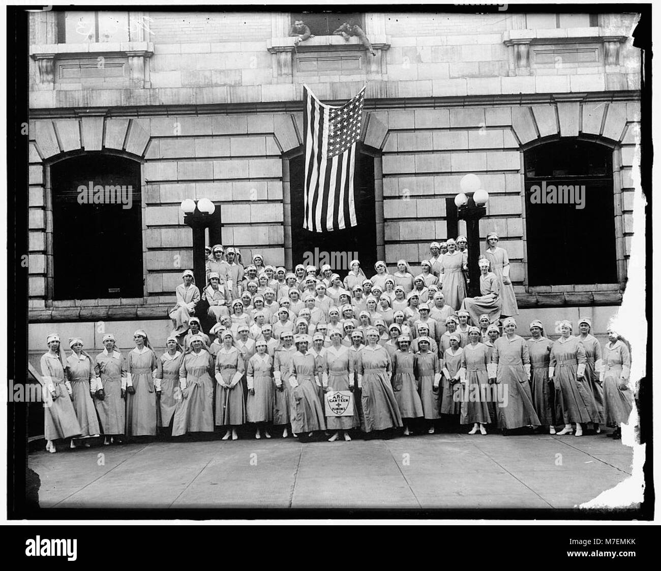 The image features the emblem and activities of the Red Cross, an ...