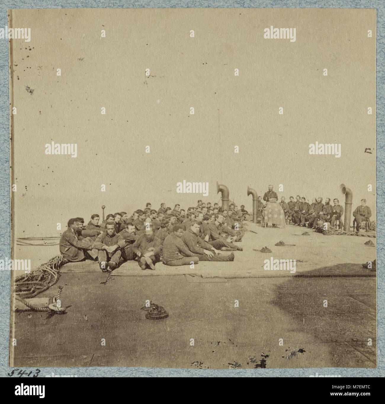 This photograph depicts a religious service held aboard the Union ...