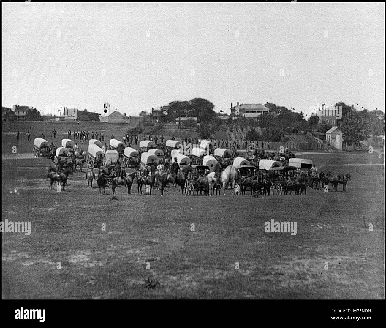 This photograph depicts a wagon train of the Military Telegraph Corps ...