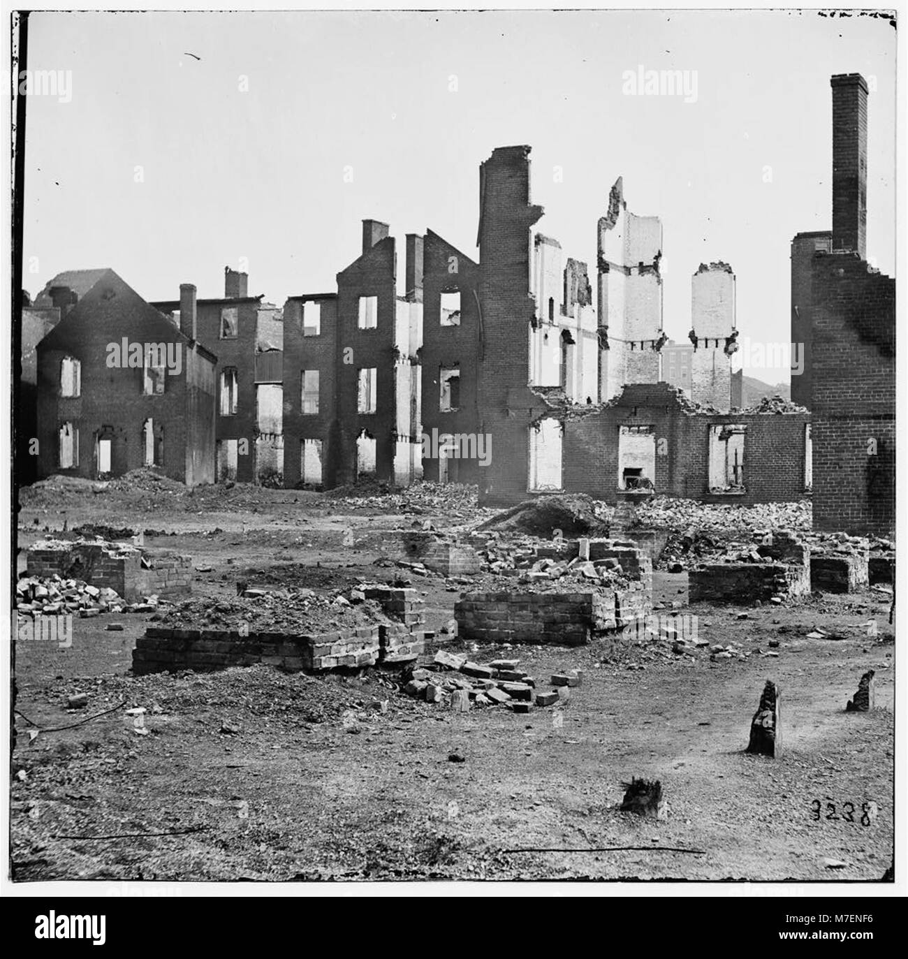 This image shows the ruined buildings in the burnt district of Richmond ...