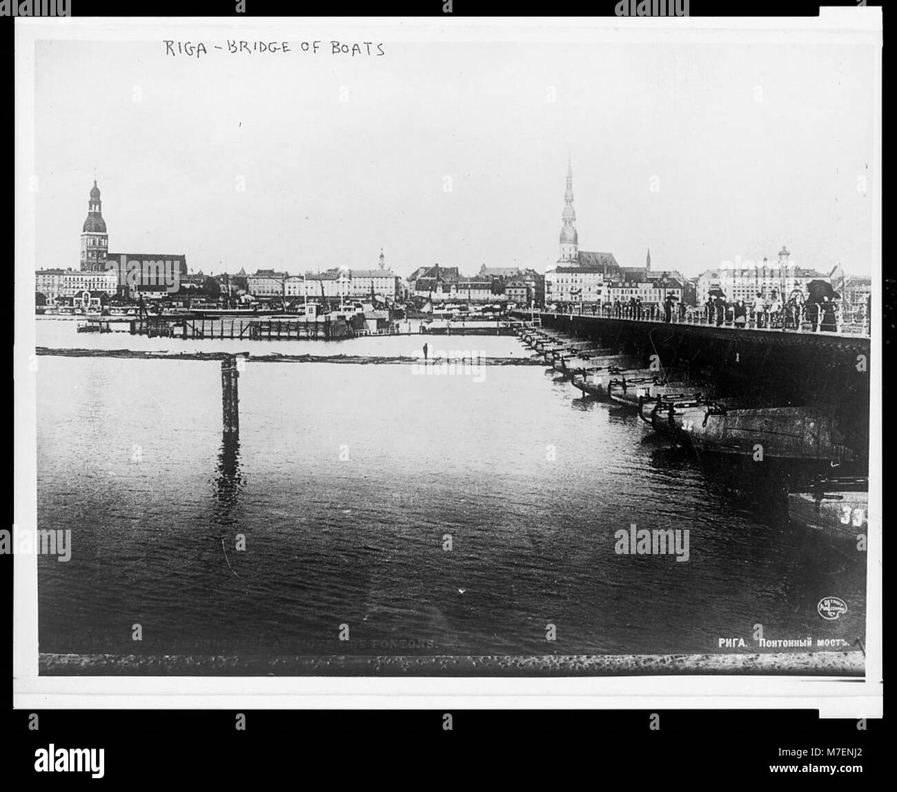 Photograph from October 18, 1919, shows a bridge of boats spanning the ...