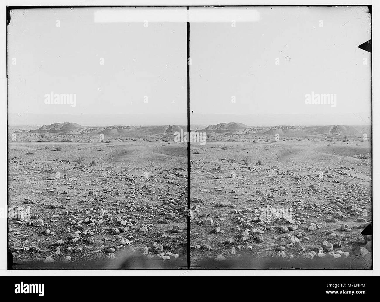This photograph shows the road to Jericho in Jordan, with a mound ...