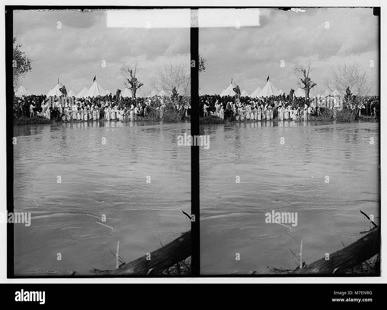 This photograph depicts Russian pilgrims along the road to Jericho ...