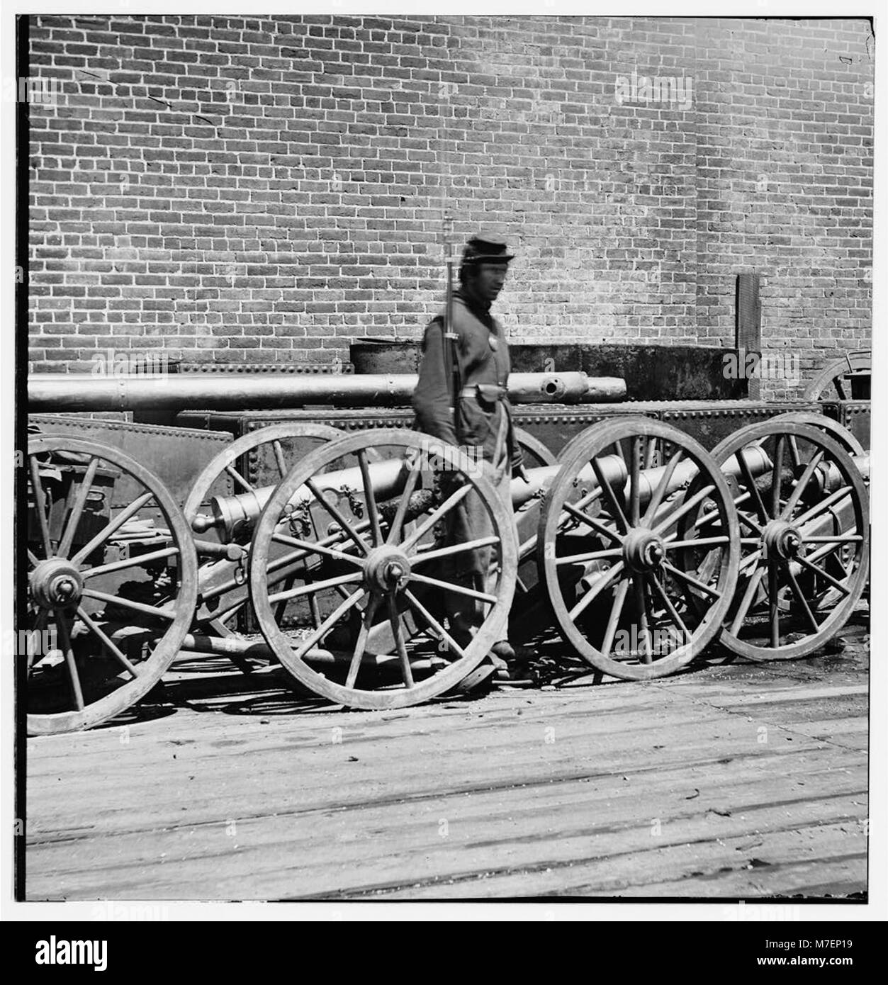 A historical photograph of Confederate brass mountain howitzers ...