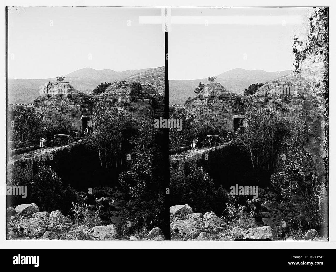 This image shows the Roman bridge and city gate in Banias, a ...