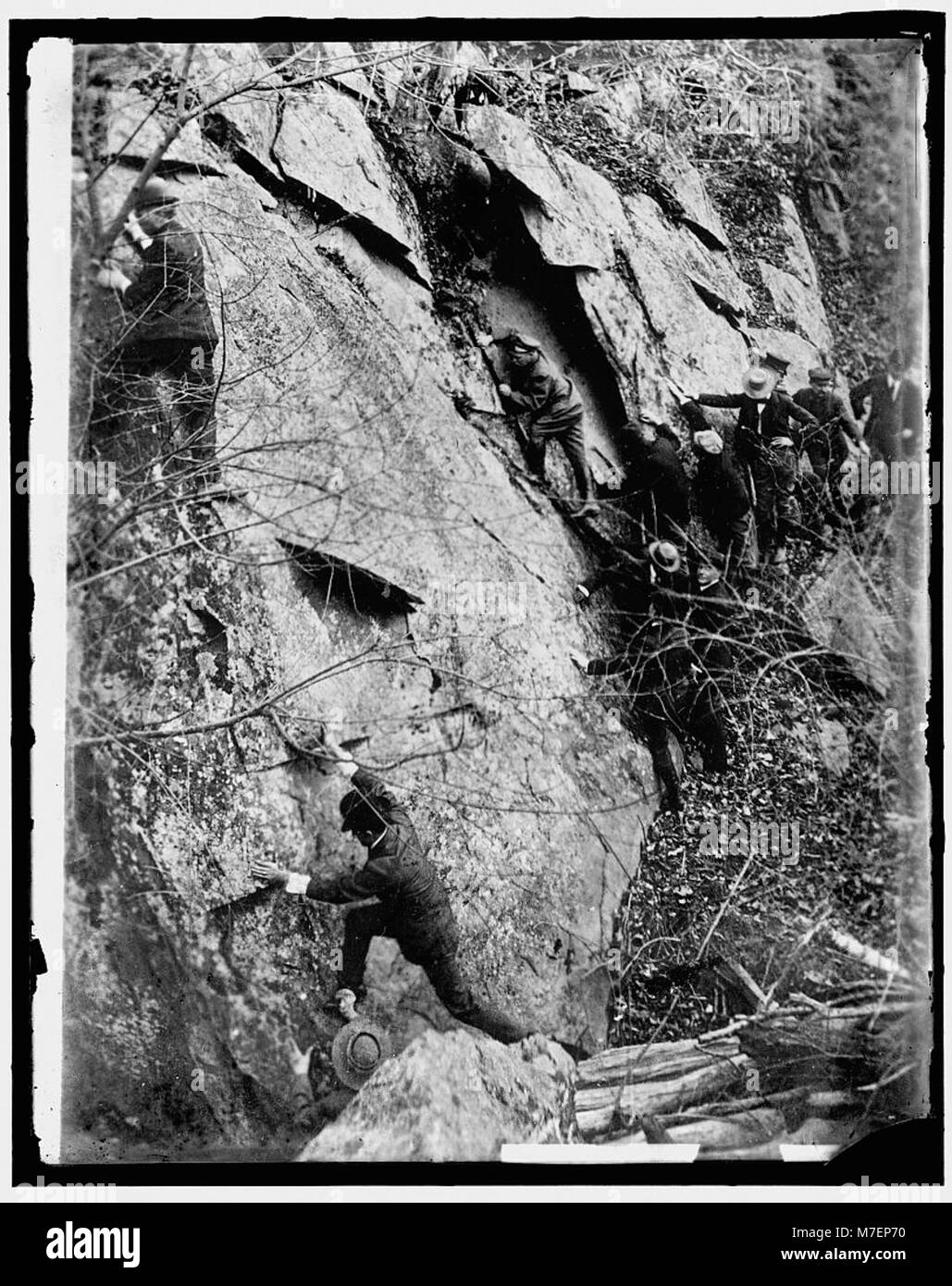 Theodore Roosevelt, shown with an army officer, reflecting his role as ...