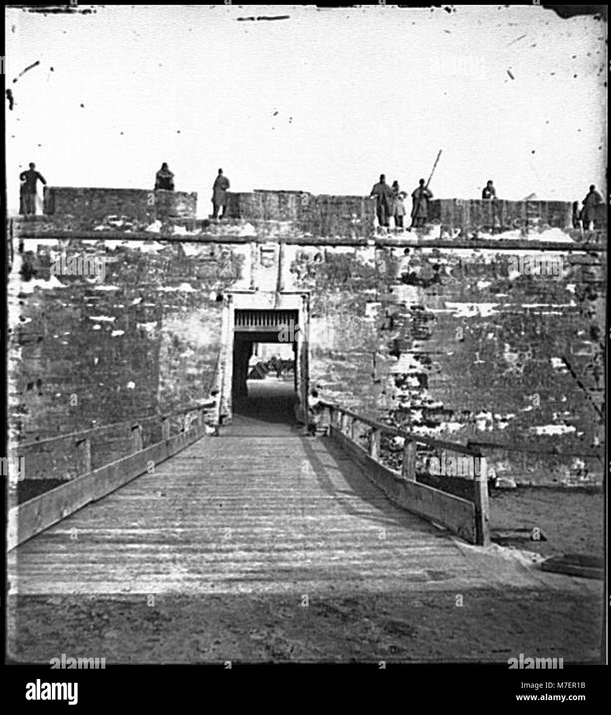 A historical photograph of the Sally Port entrance to Fort Marion in ...