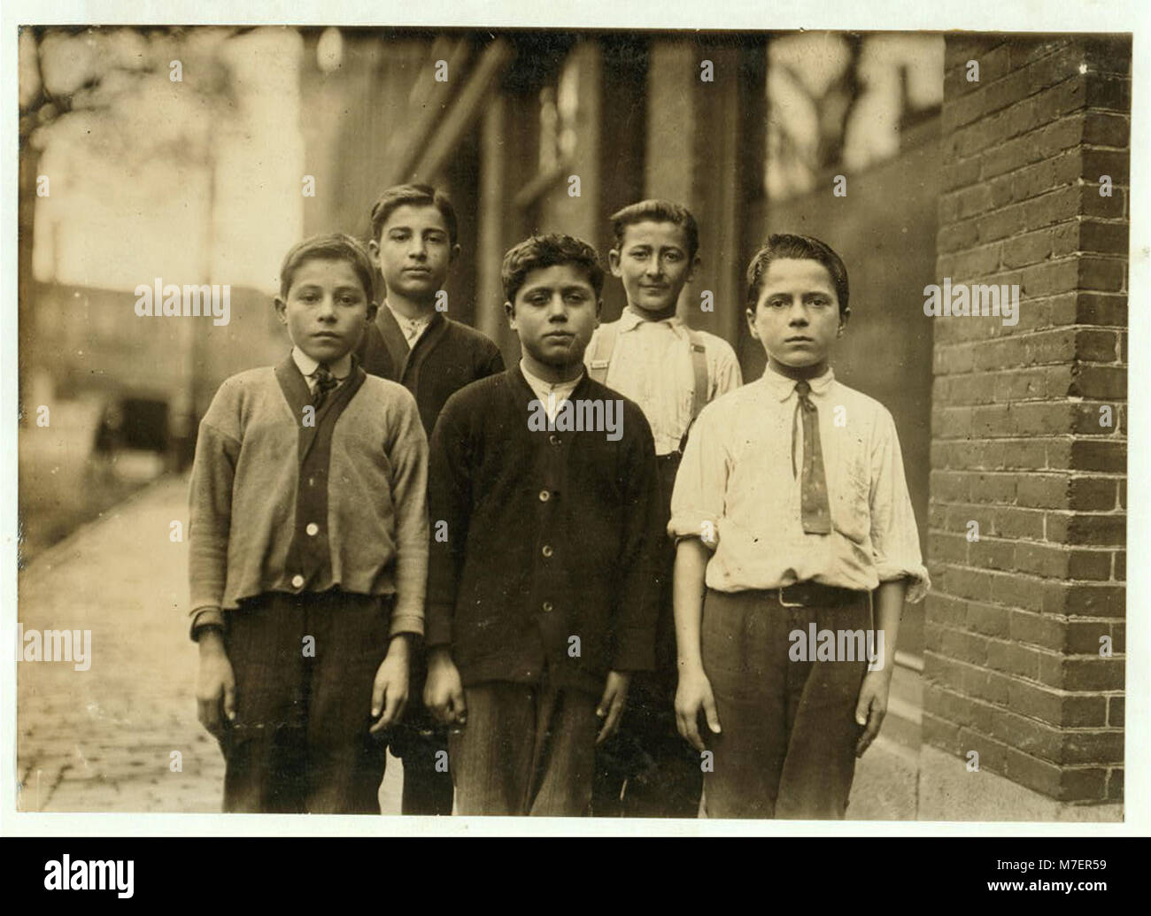 This image shows a group of boys who work late into the night, often ...