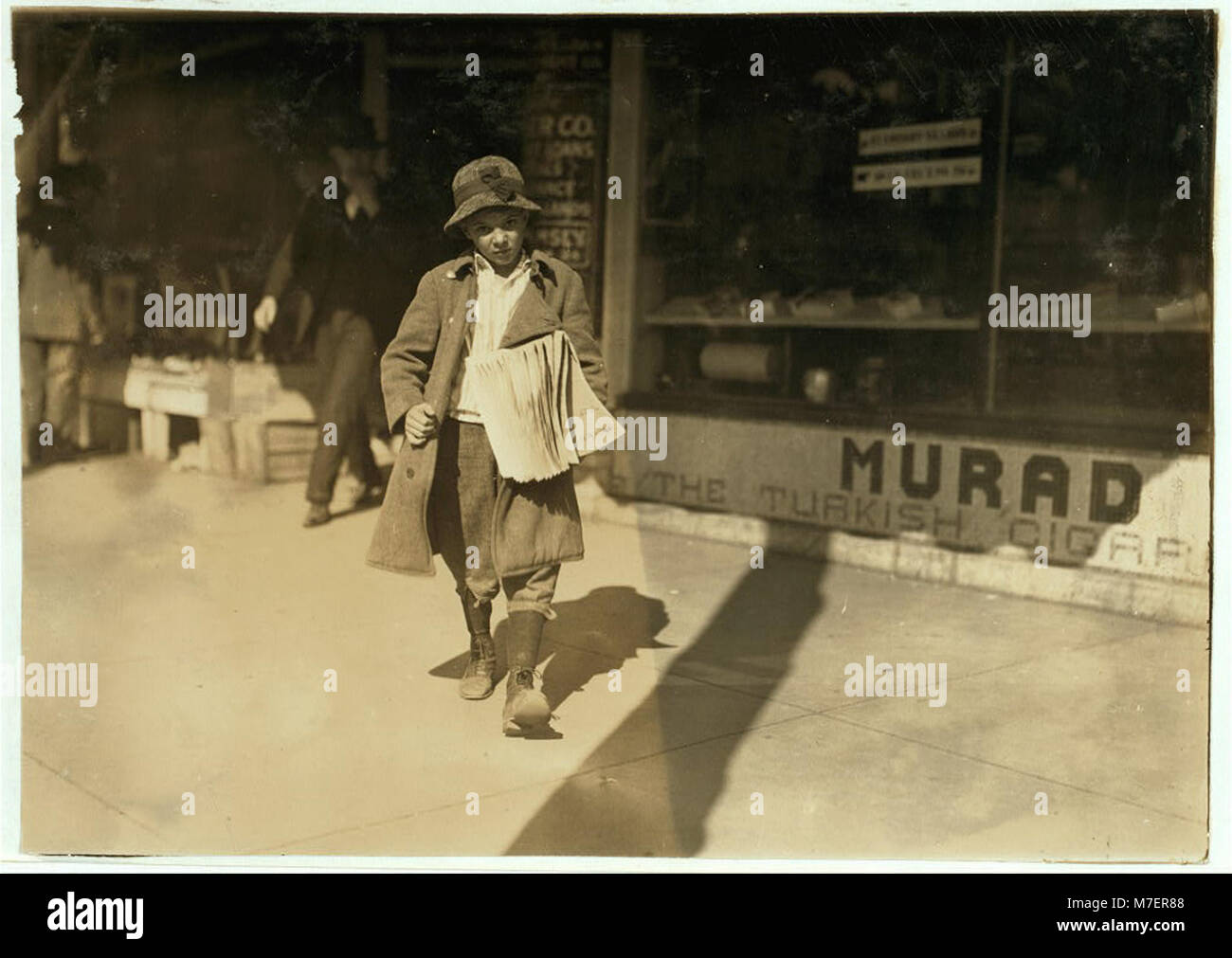 Sam Pine, an 8-year-old newsboy from California Street, explains his ...