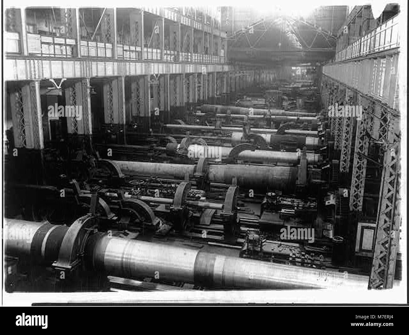 A photograph depicting a scene inside the Naval Gun Shop in Washington ...