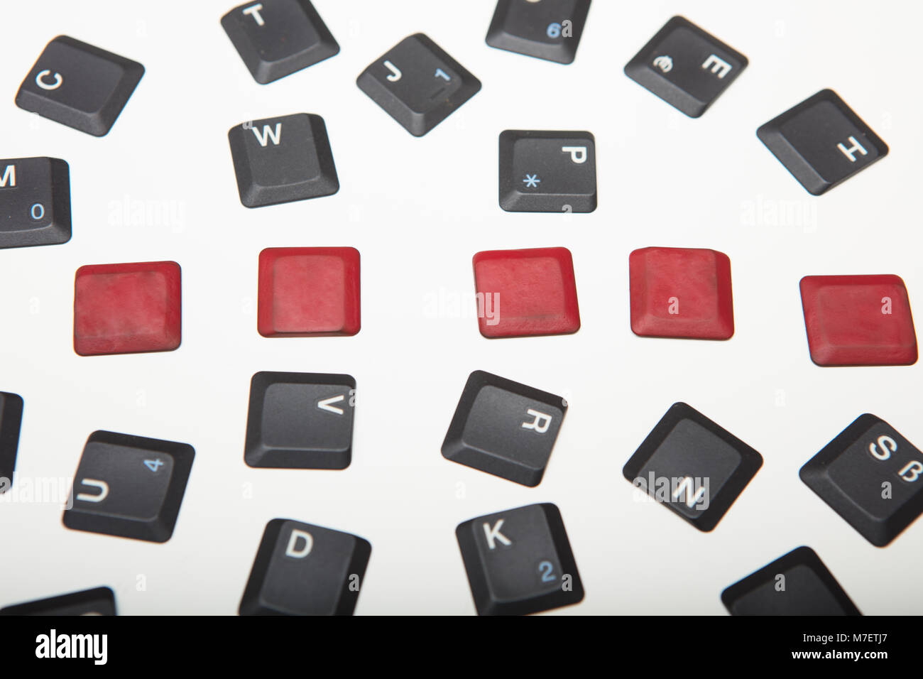 Overhead view of a composed alphanumeric computer keyboard with five ...