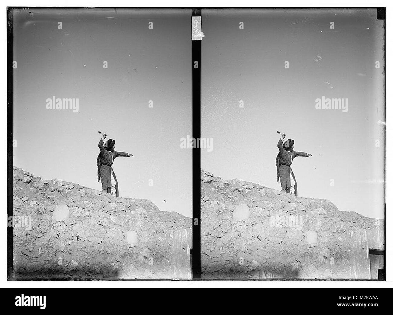 A young shepherd boy pictured while slinging, a traditional activity of ...