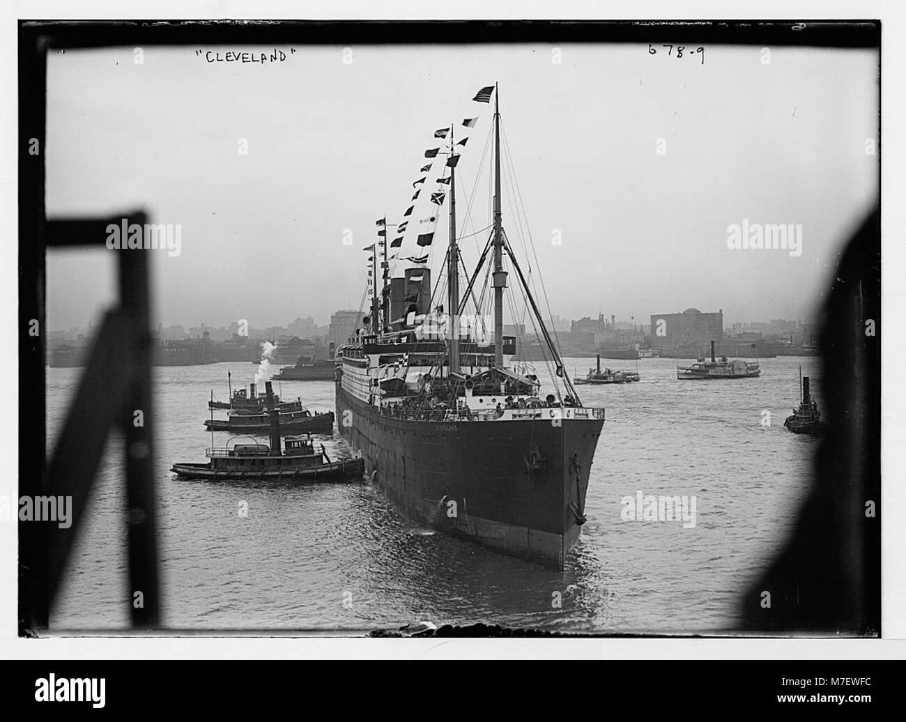 This photograph depicts the ship 'Cleveland' as it arrives at port ...