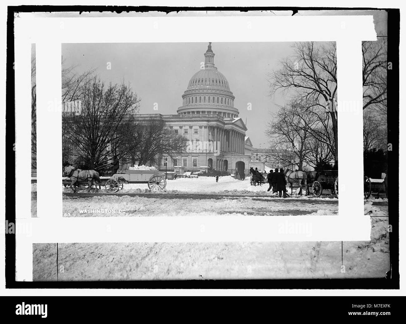 Photograph of a snow-covered scene at the U.S. Capitol, capturing the ...