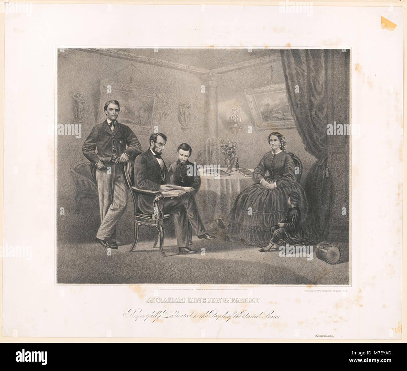 A historic photograph of Abraham Lincoln with his family. The image ...
