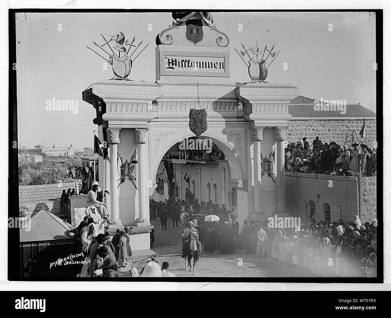 A photograph capturing a large crowd awaiting the arrival of Wilhelm II ...