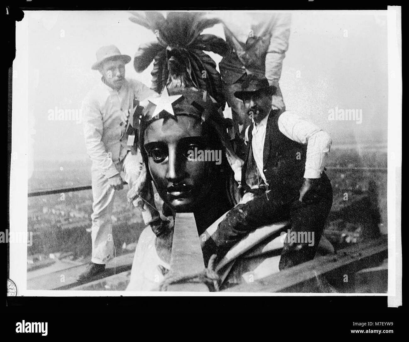 A photograph showcasing the statue atop the U.S. Capitol building in ...