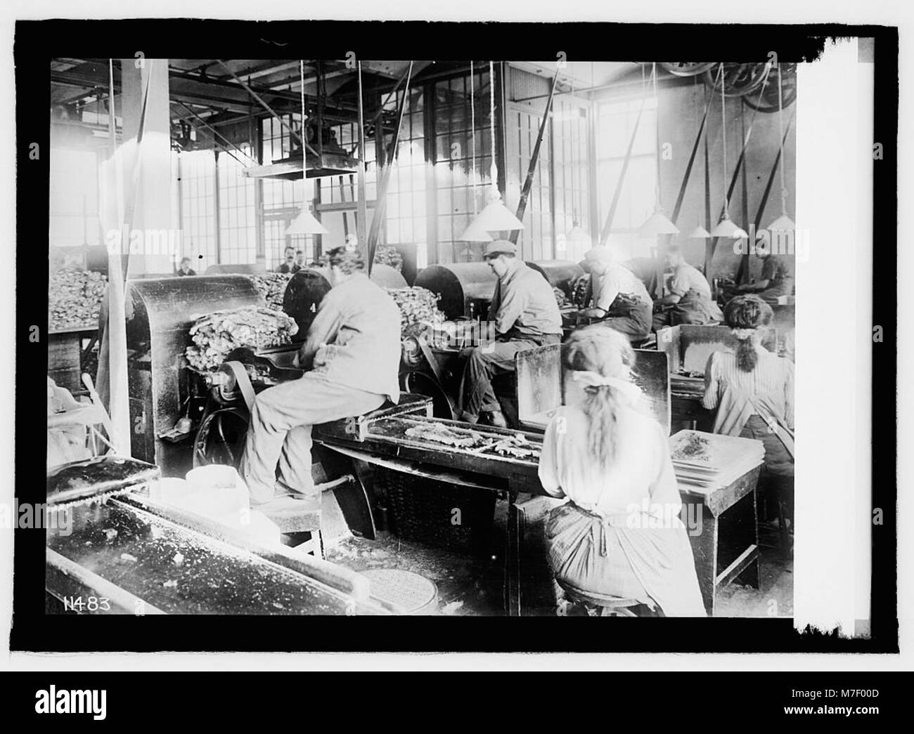 An image depicting the Stetson Hat Company manufacturing army hats ...