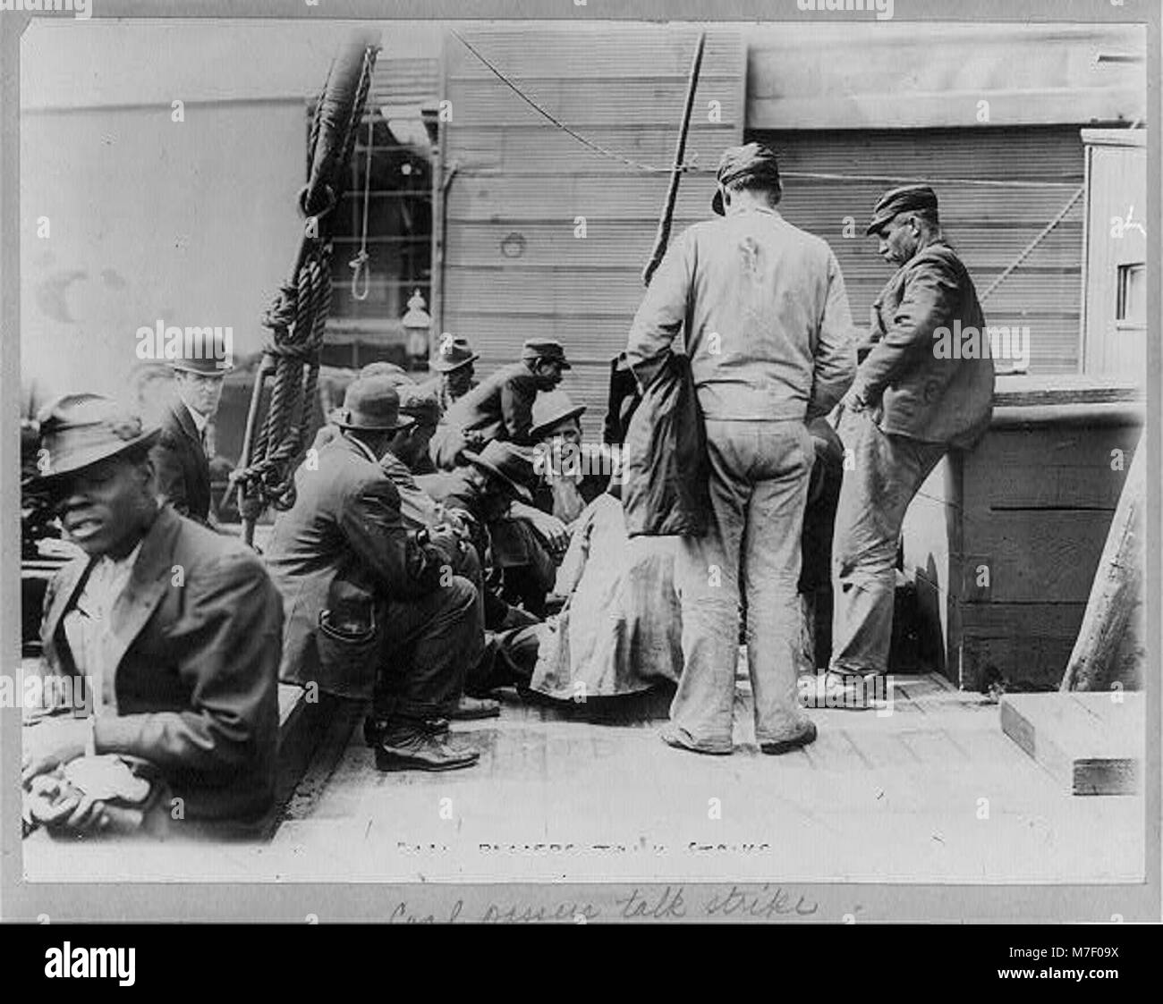An image documenting a seamen's strike, featuring discussions among ...