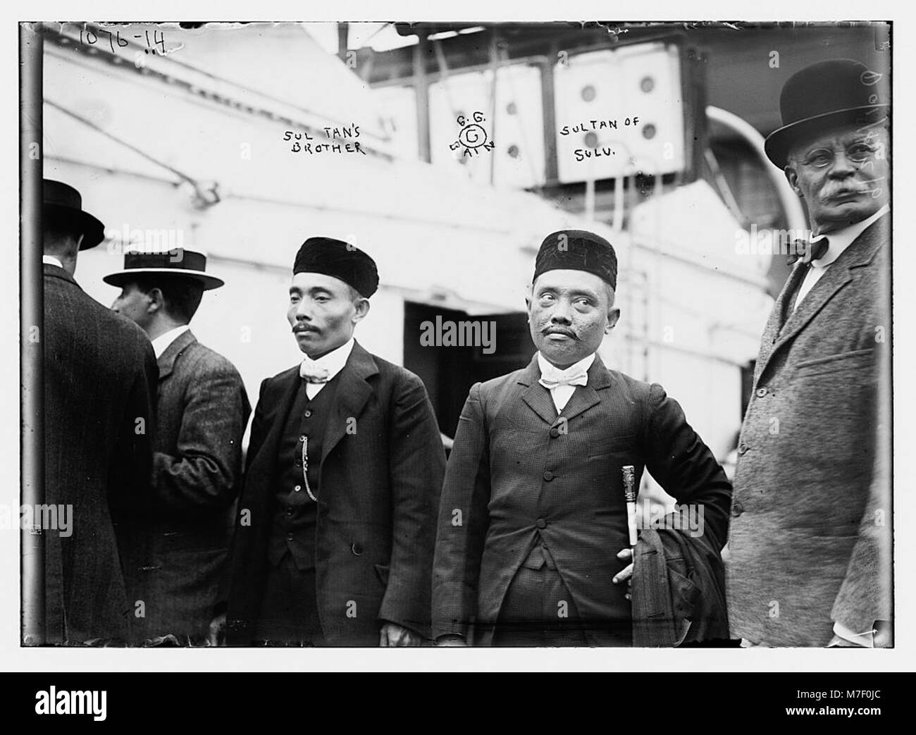 A photograph of the Sultan of Sulu with his brother and others, likely ...