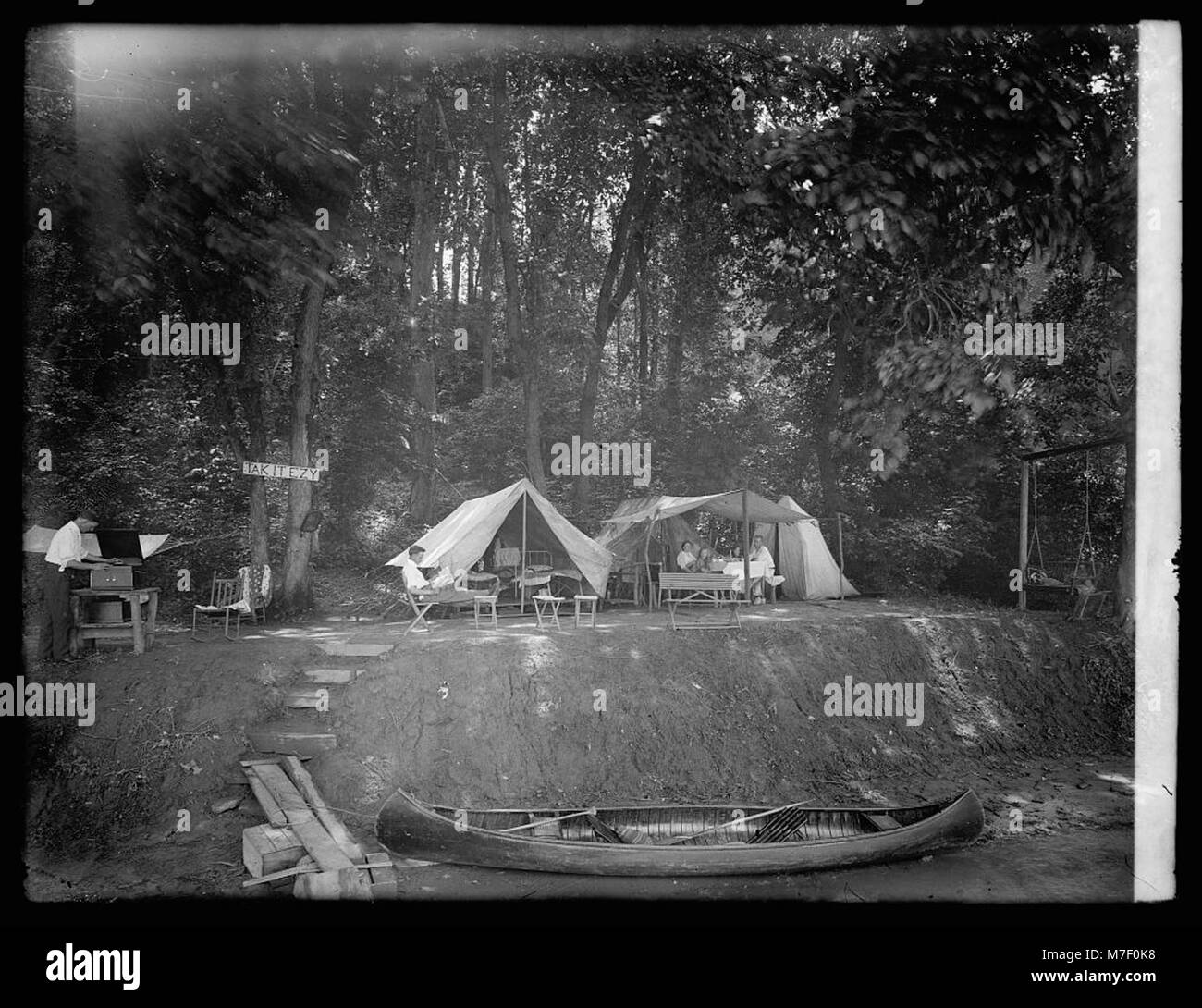 A photograph showing children at a summer camp, likely participating in ...