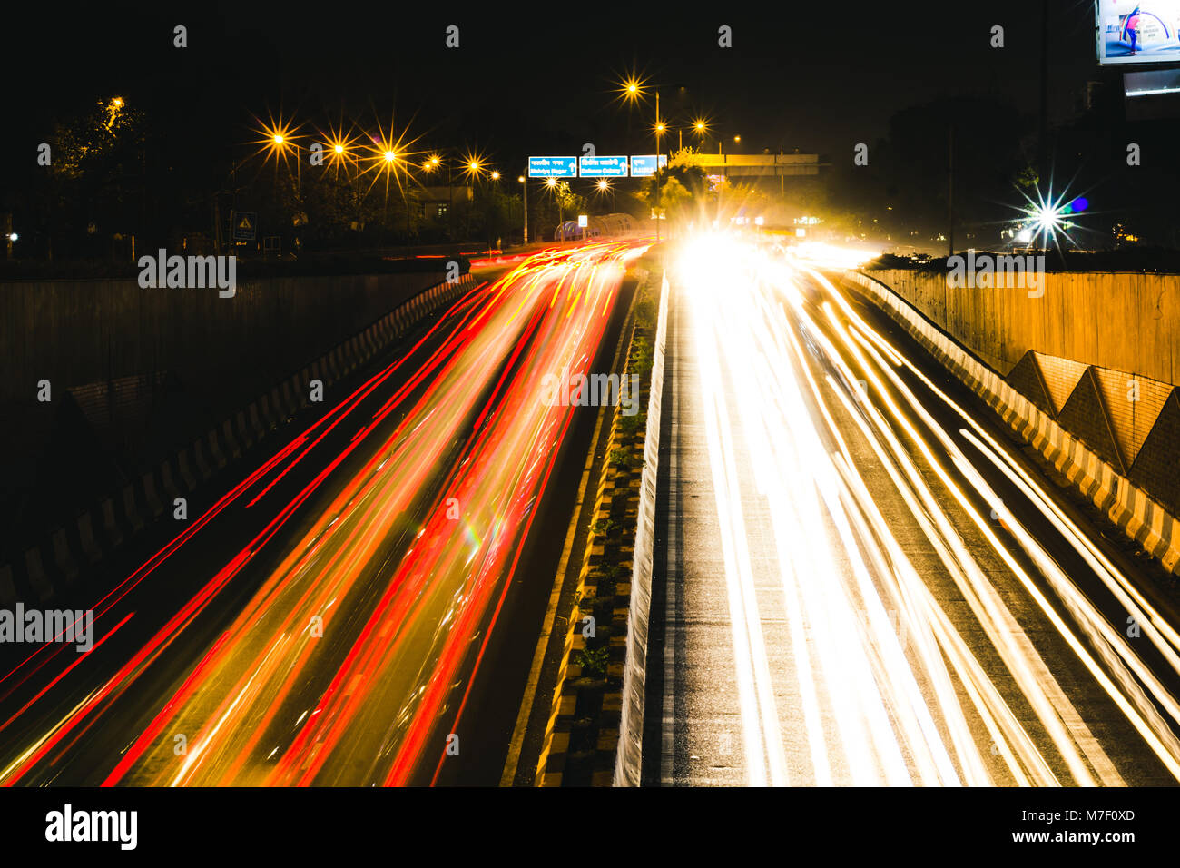 Light trails of cityscape in twilight at night Stock Photo - Alamy