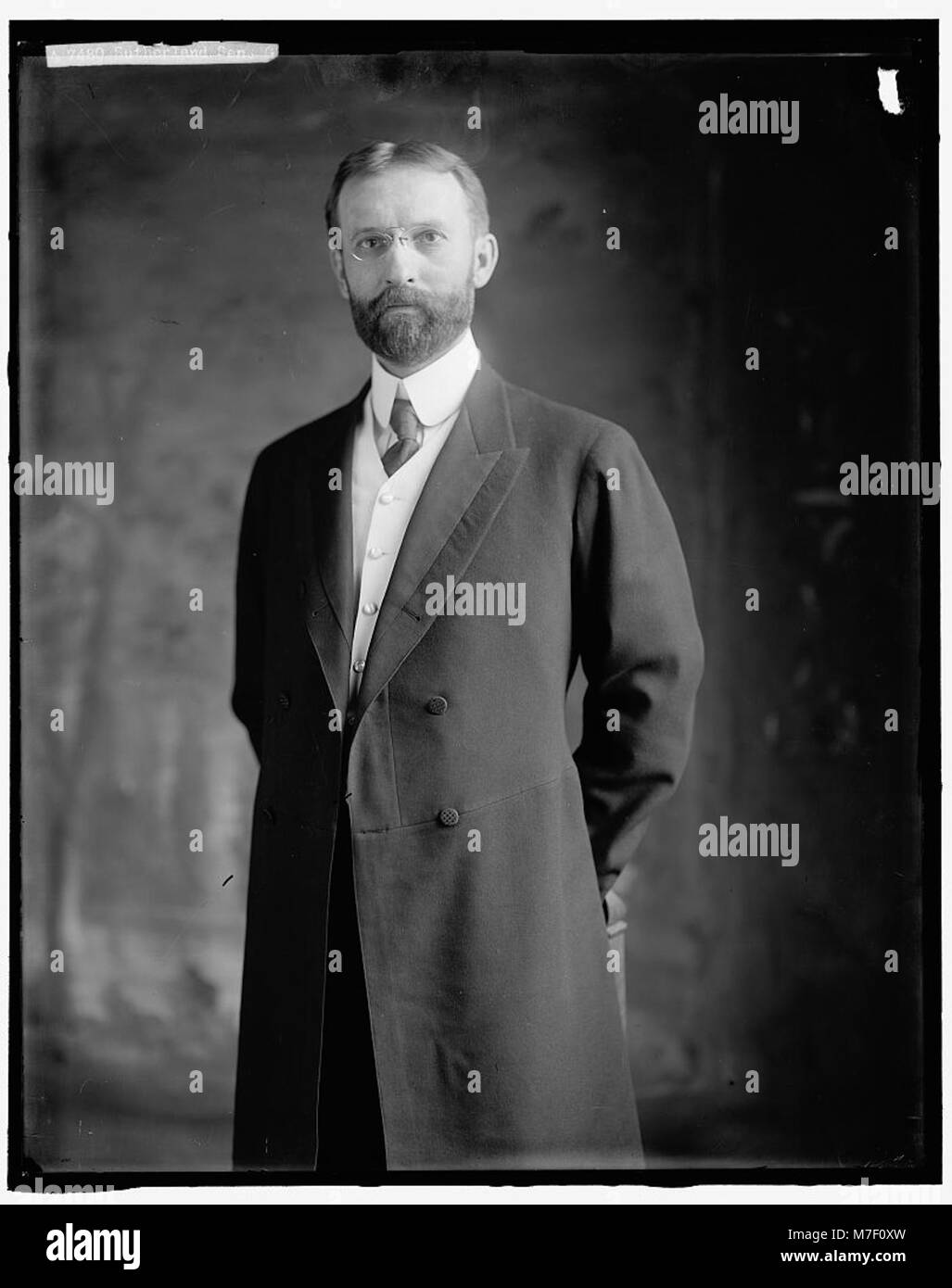 A formal portrait of Senator G. Sutherland, emphasizing his professional role in U.S. government ...