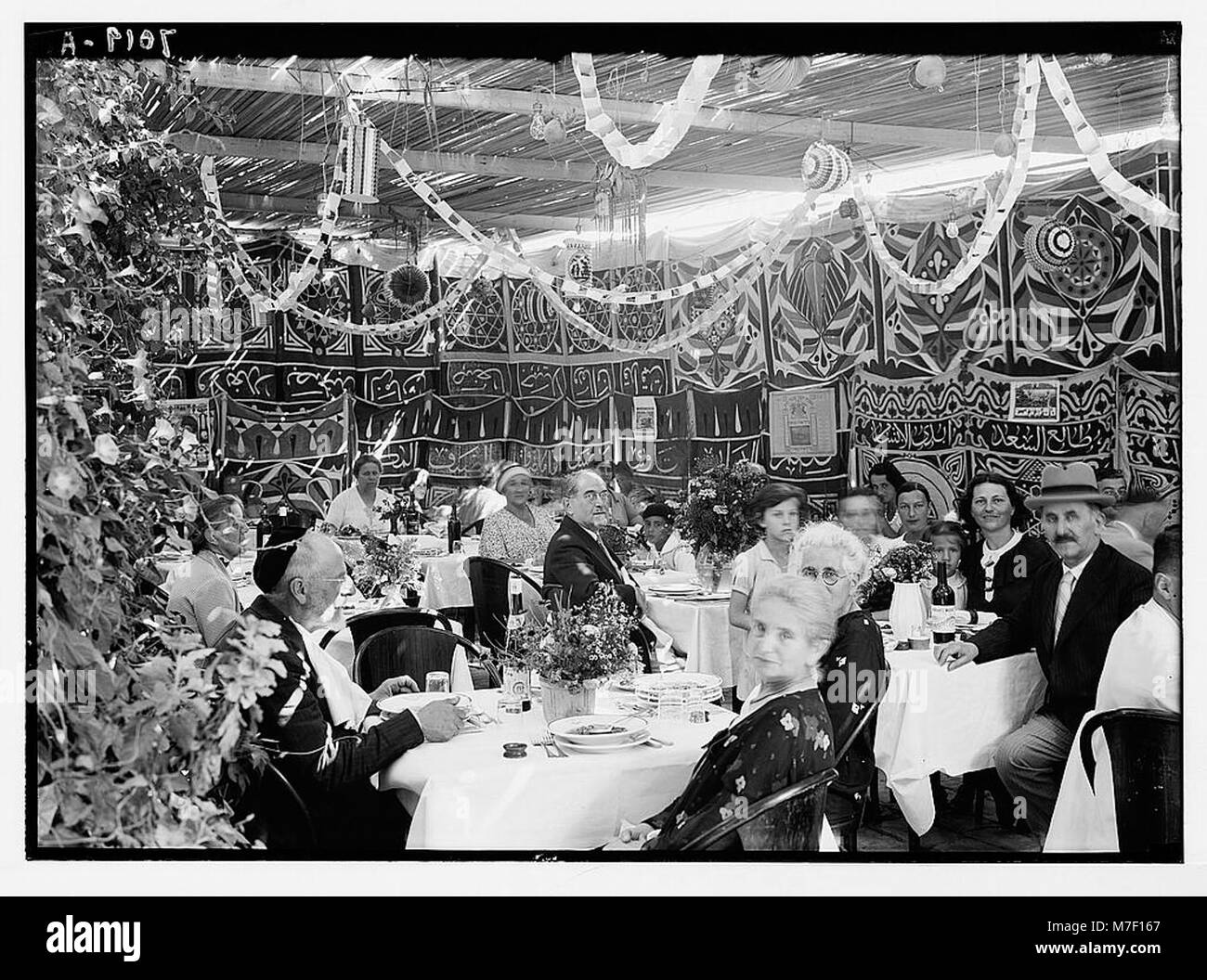 A photograph of the Tabernacle (Sukkot) and the exterior and interior ...