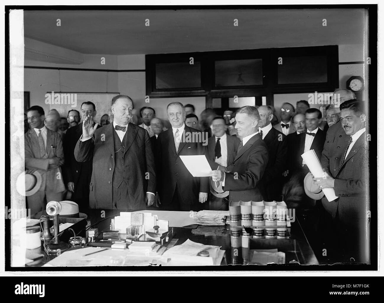 This photograph captures William Howard Taft taking the oath of office ...