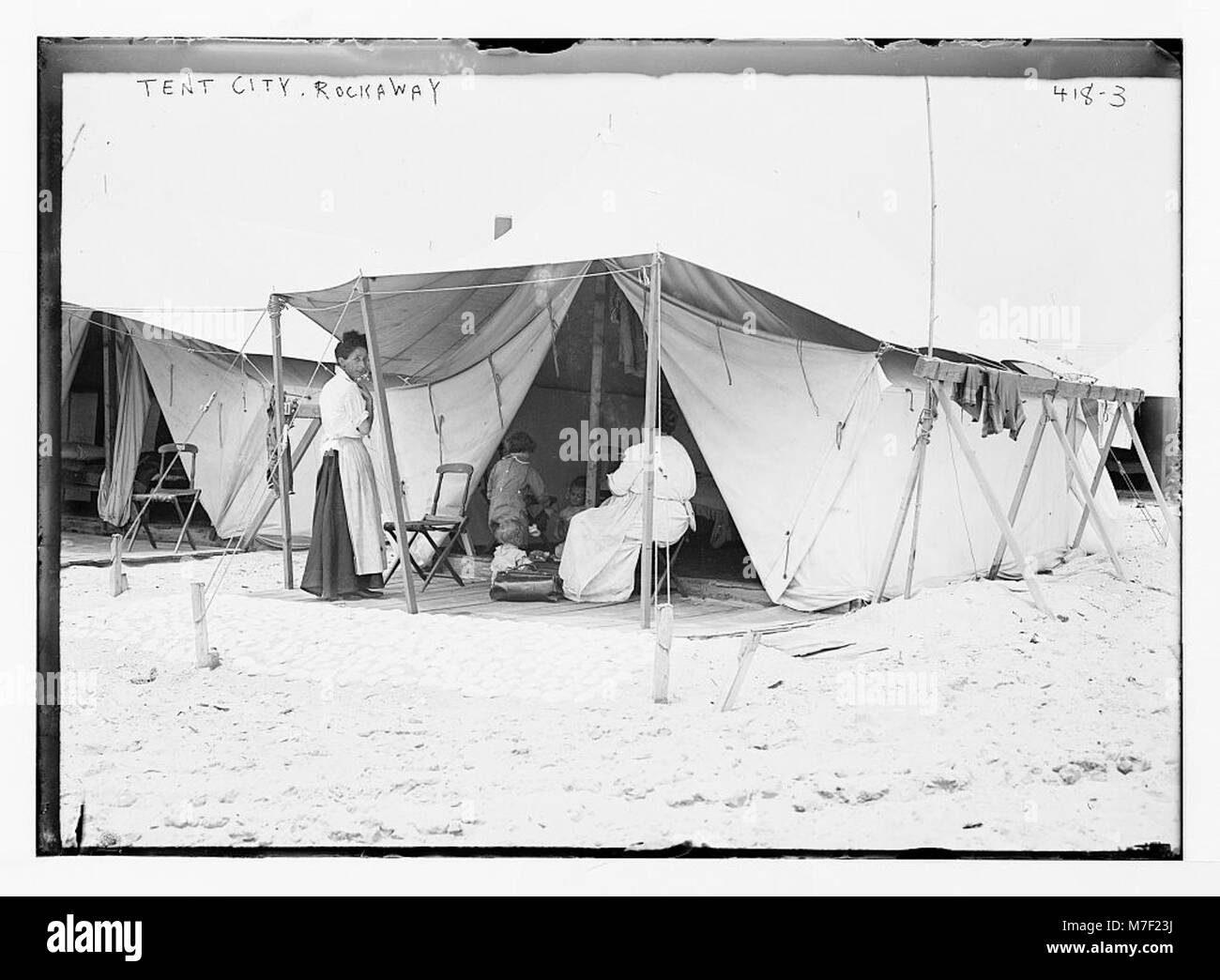 This photograph depicts Tent City in Rockaway, a temporary settlement ...