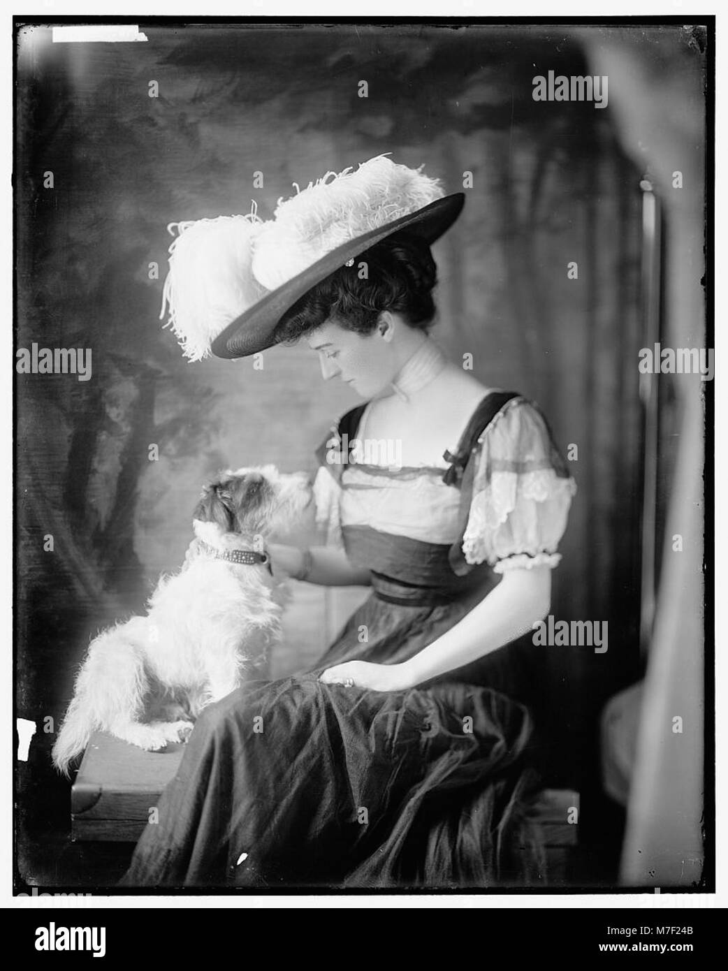 A formal portrait of Miss Terry, offering a glimpse into her life and ...