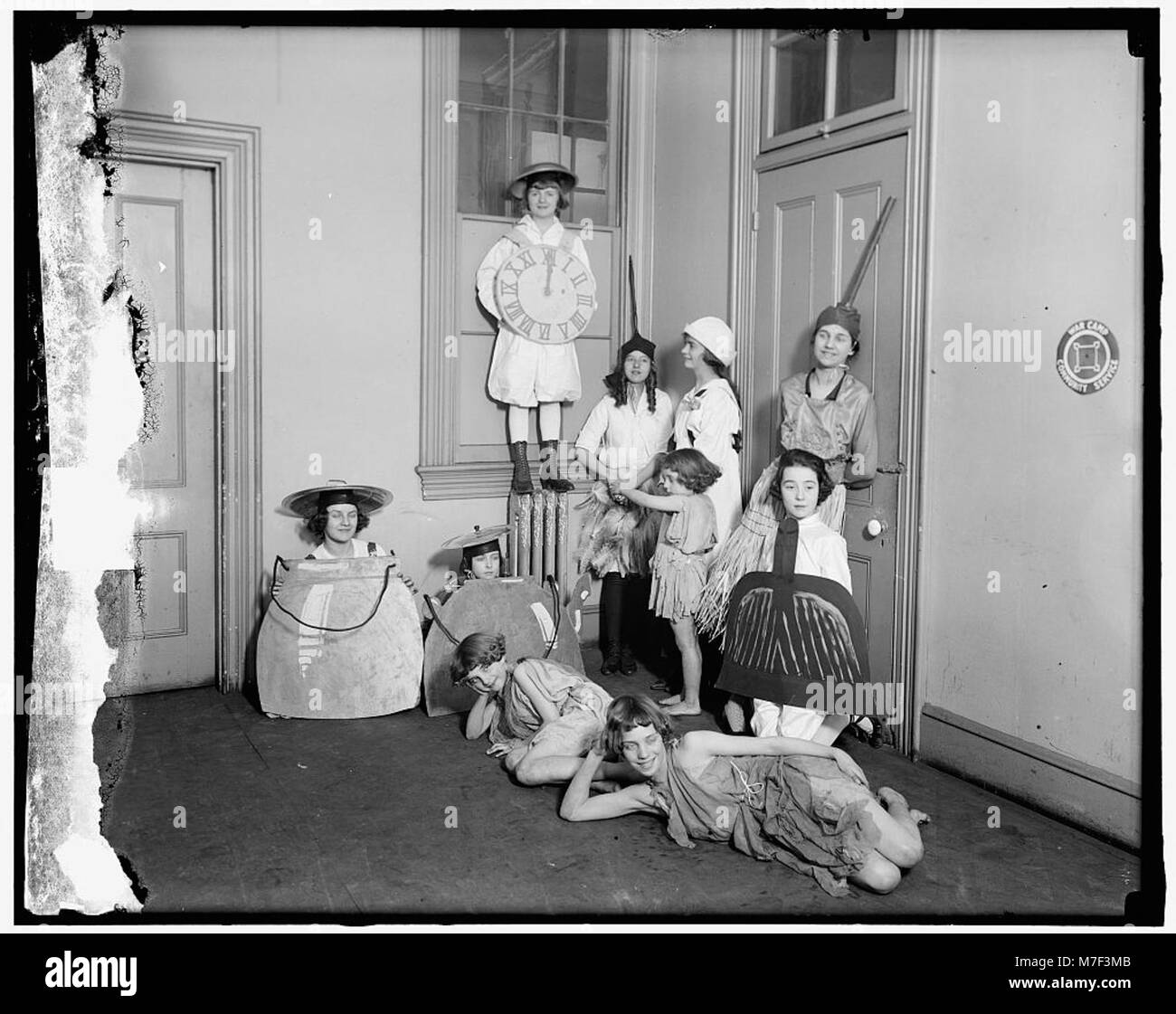 This image features a vintage kitchen clock, capturing a domestic ...