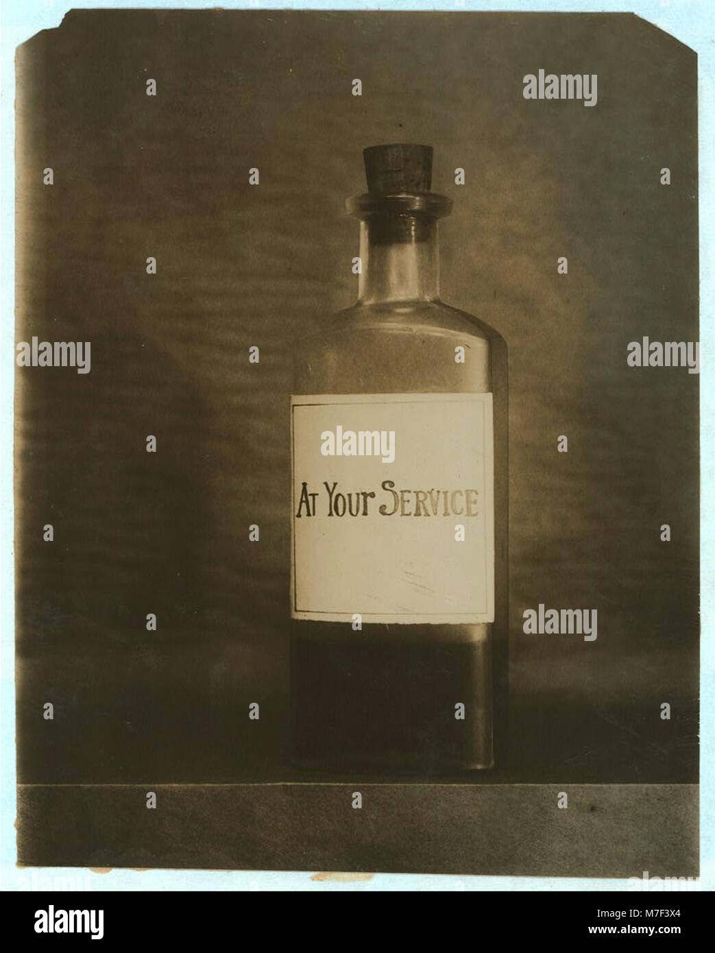 A photograph of an old medicine bottle, representing the early history ...