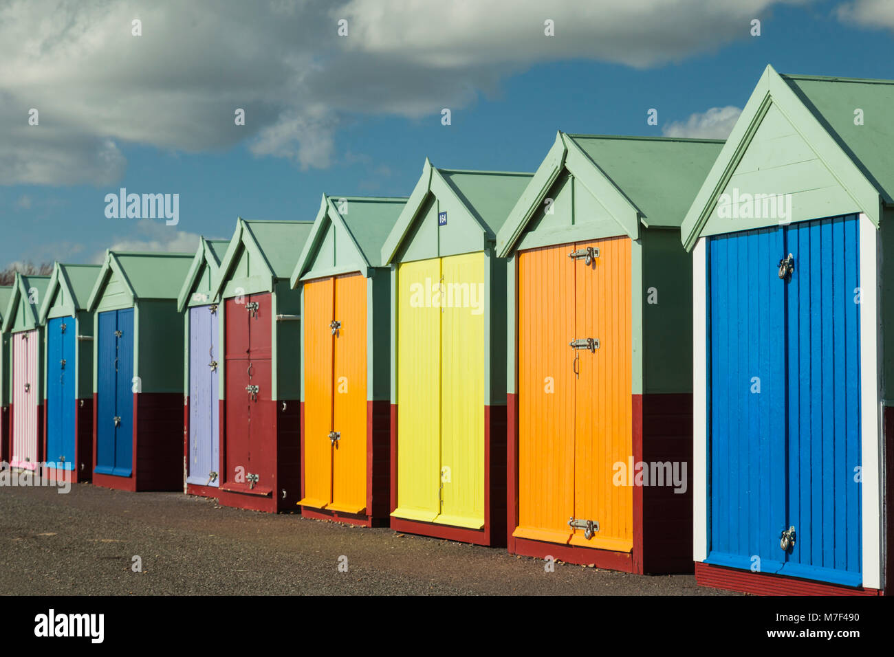 Multi-coloured beach huts on Hove seafront, England Stock Photo - Alamy