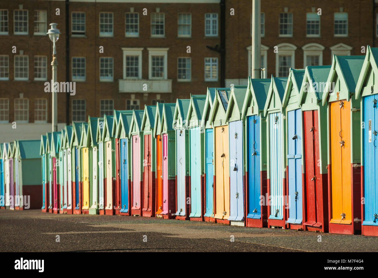 Colourful beach huts on Brighton seafront, England Stock Photo - Alamy