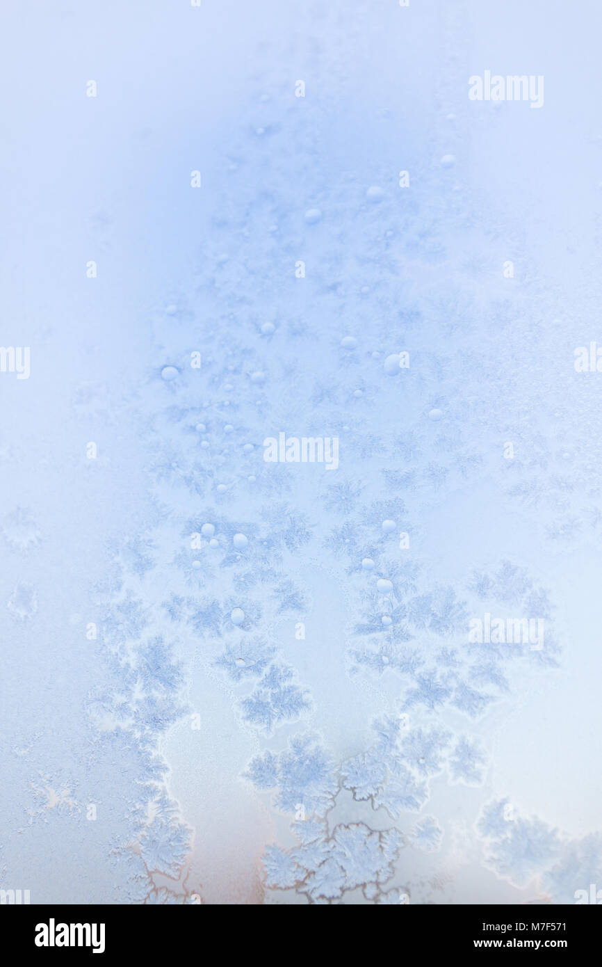 Winter frosty patterns on the frozen ice window Stock Photo - Alamy