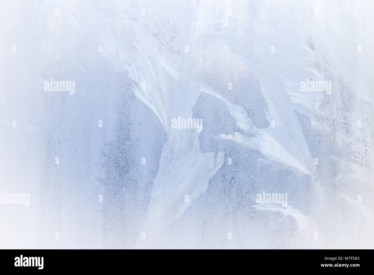 Winter frosty patterns on the frozen ice window Stock Photo - Alamy