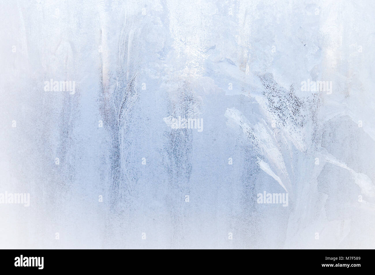 Winter frosty patterns on the frozen ice window Stock Photo - Alamy