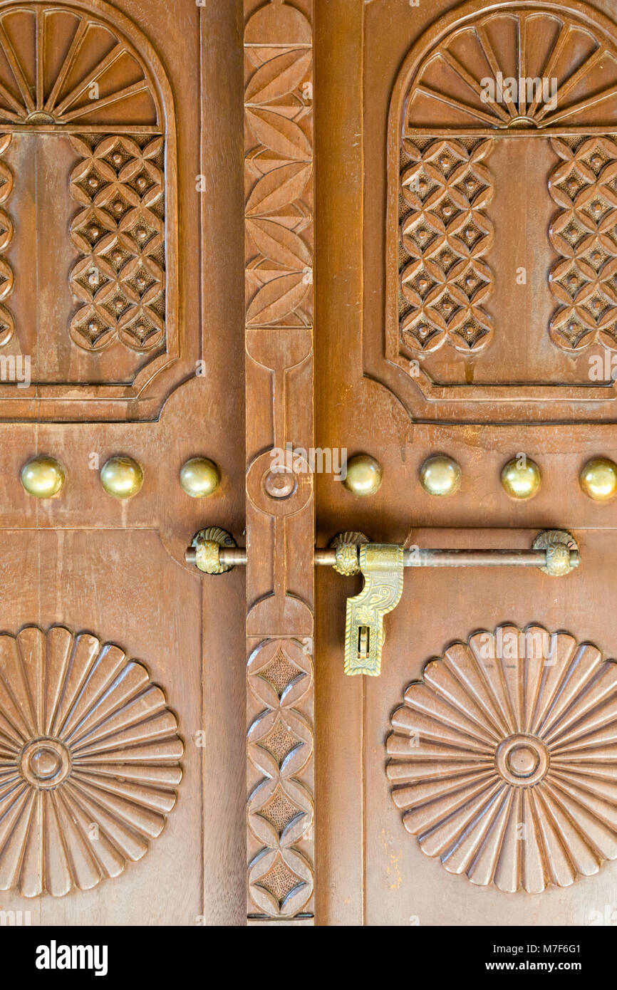 Mosque door. Carved and detailed wooden door on a mosque in Al Ain ...