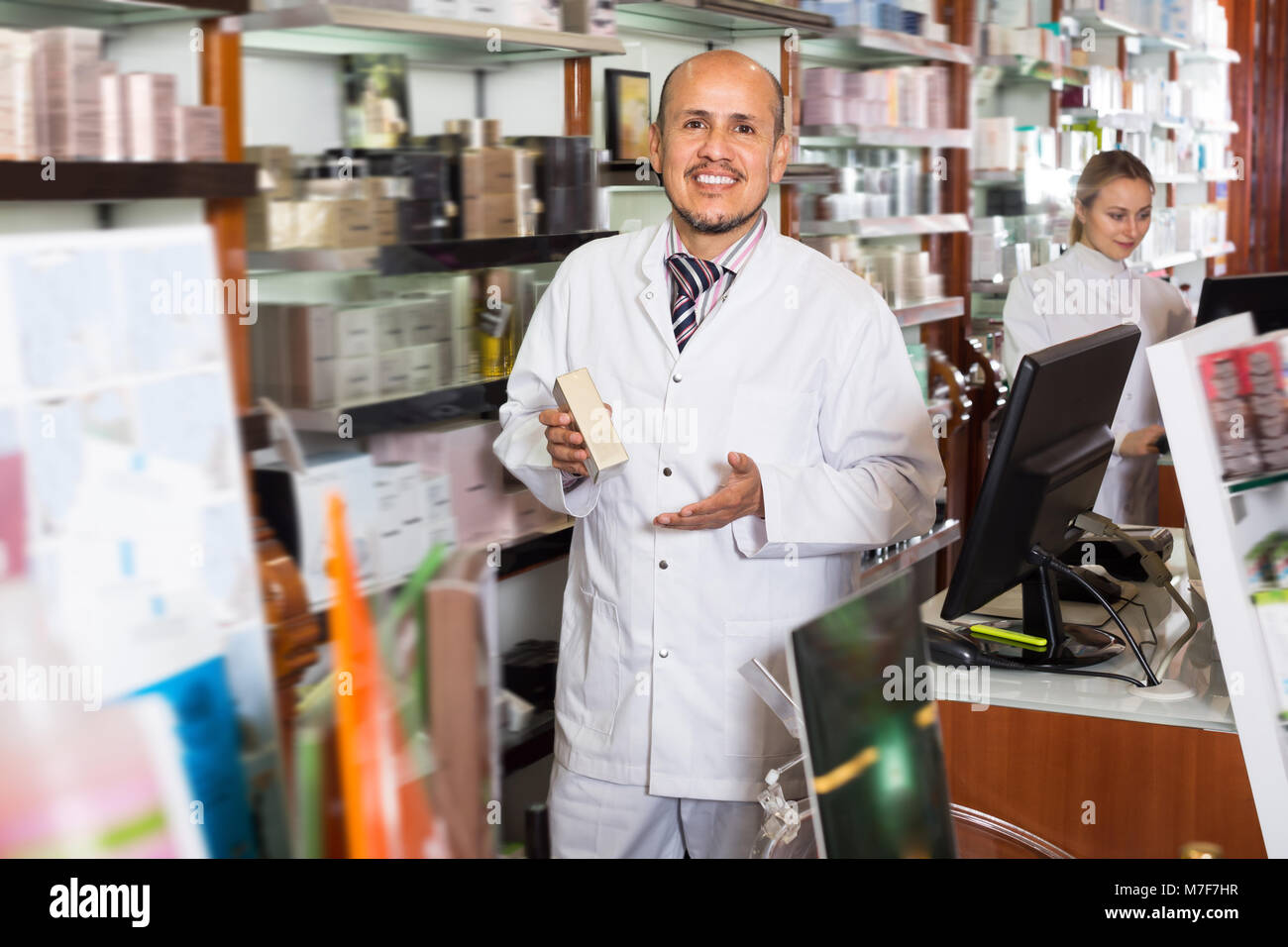 Young mature pharmacists standing hi-res stock photography and images ...