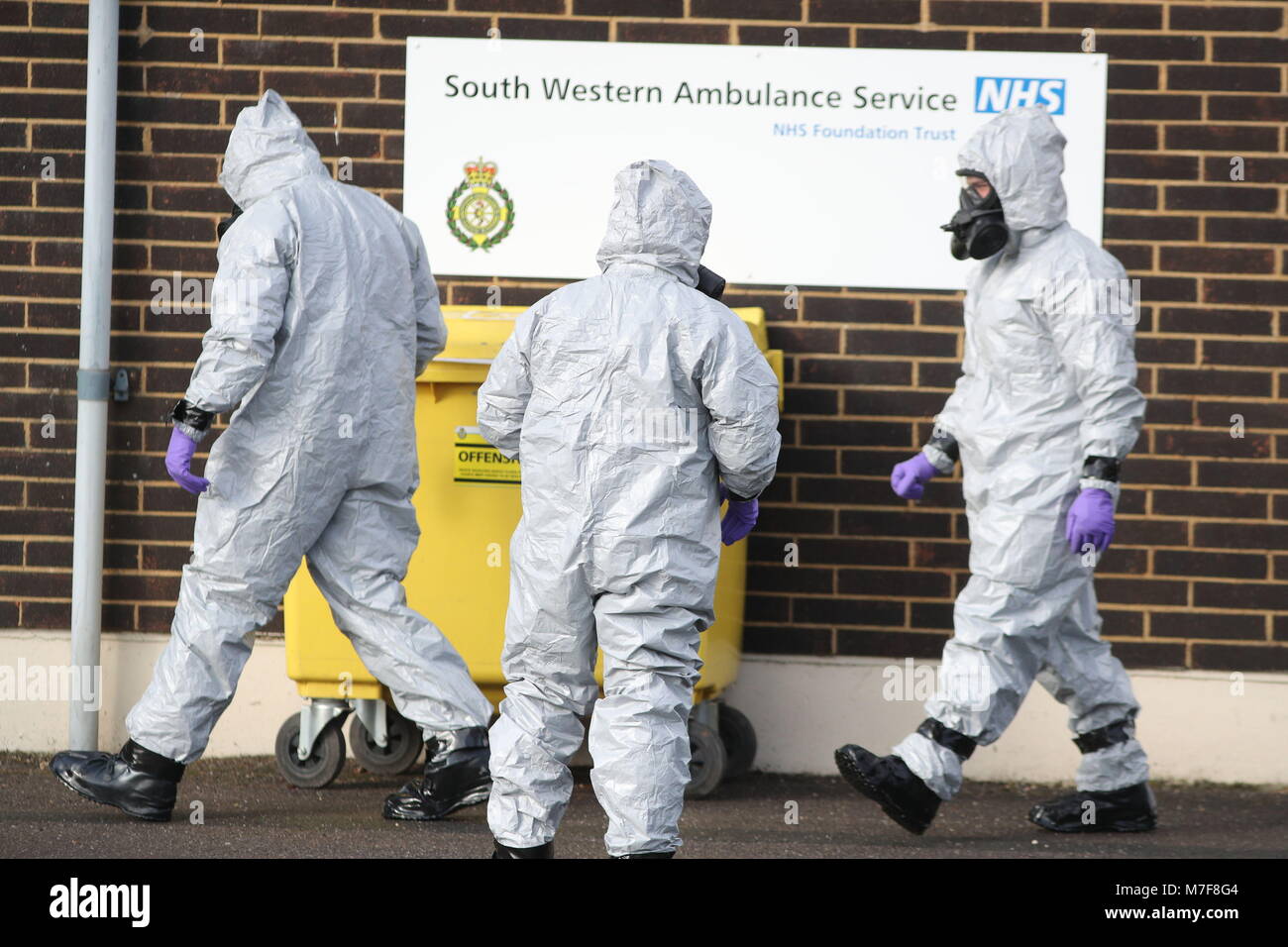 Investigators in gas masks at the South Western Ambulance Service ...