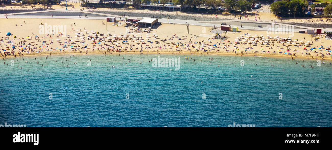 Crowded beach in Barcelona seaside, Spain Stock Photo - Alamy